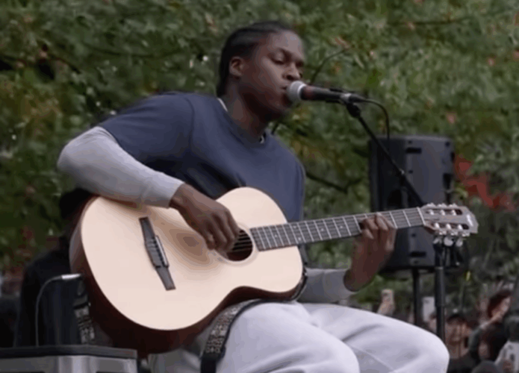 Watch: Daniel Caesar's Surprise Pop-Up Show Lights Up Atlanta ...